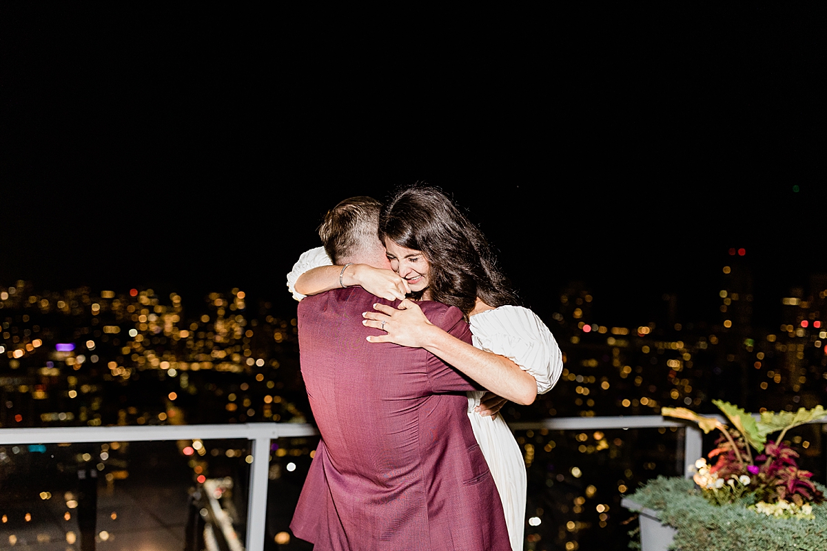 Surprise Nighttime Proposal on a Rooftop in Chicago - expeditionjoy.com